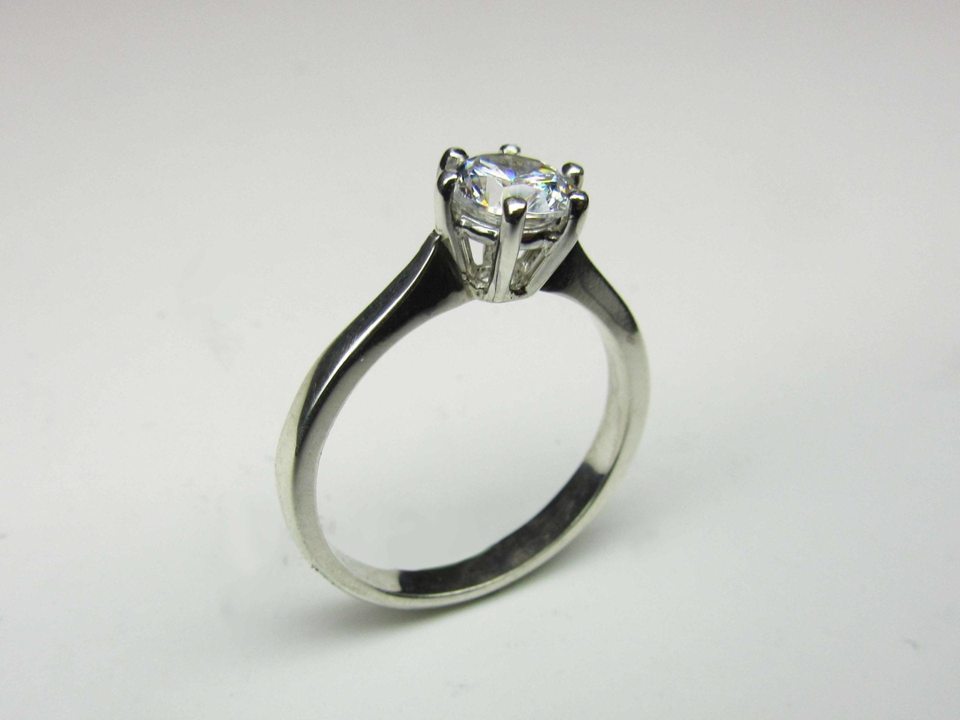 How to Make a Six Claw Solitaire Ring - How-To Video - Ganoksin Jewelry ...